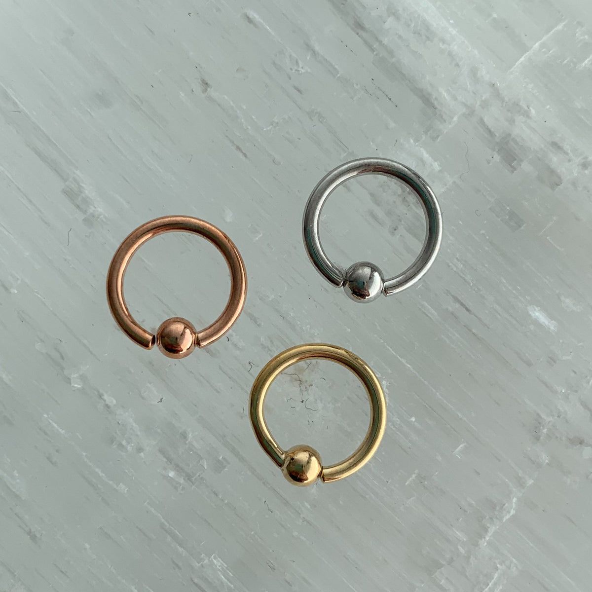 14k Gold Fixed Bead Ring – Brilliance Piercing